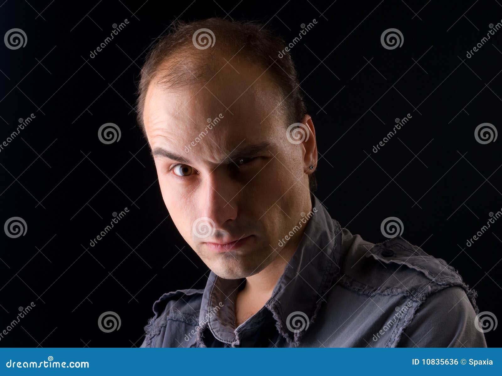 Wicked face of young man stock photo. Image of face, offence - 10835636