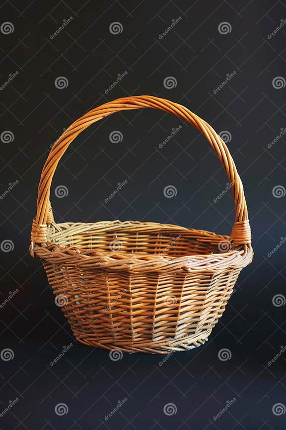 A Wicker Basket on a Dark Backdrop, Suitable for Various Design ...