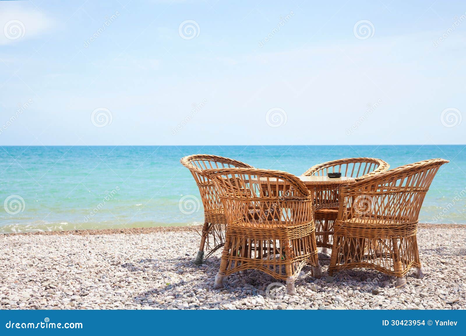 Wicker chairs on the beach stock photo. Image of relax - 30423954