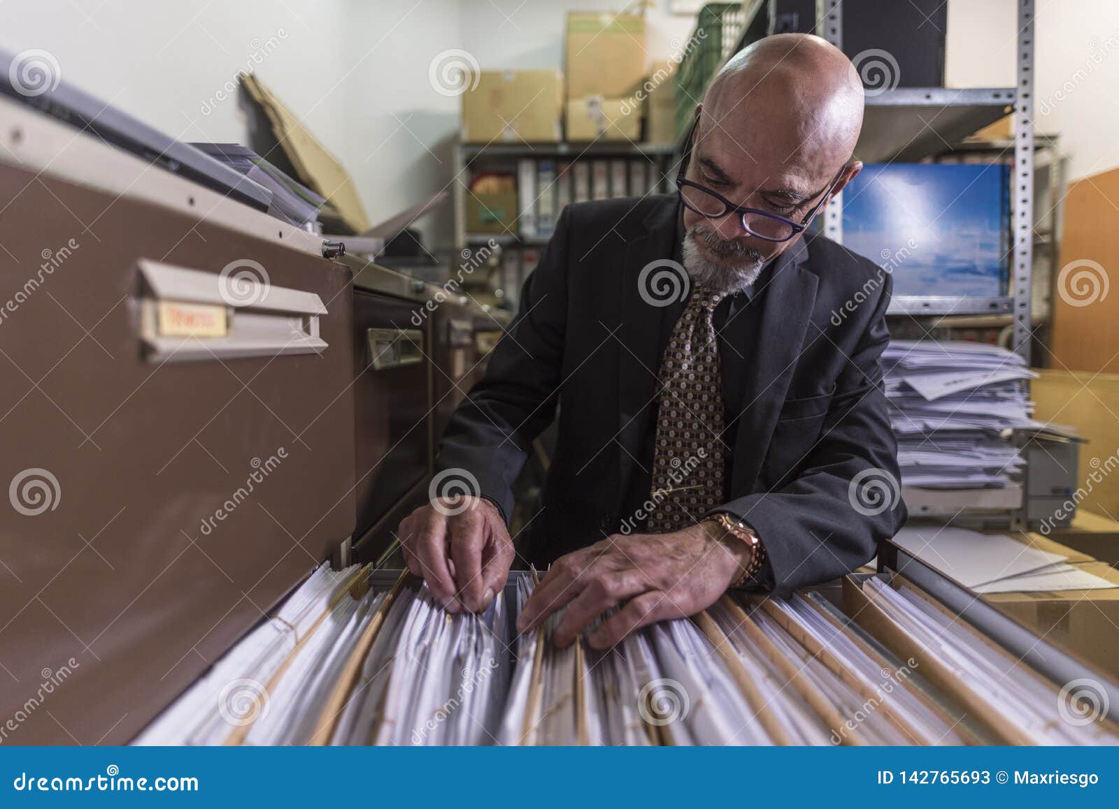Wide Angle Image of Senior Man Looking Files Stock Image - Image of ...