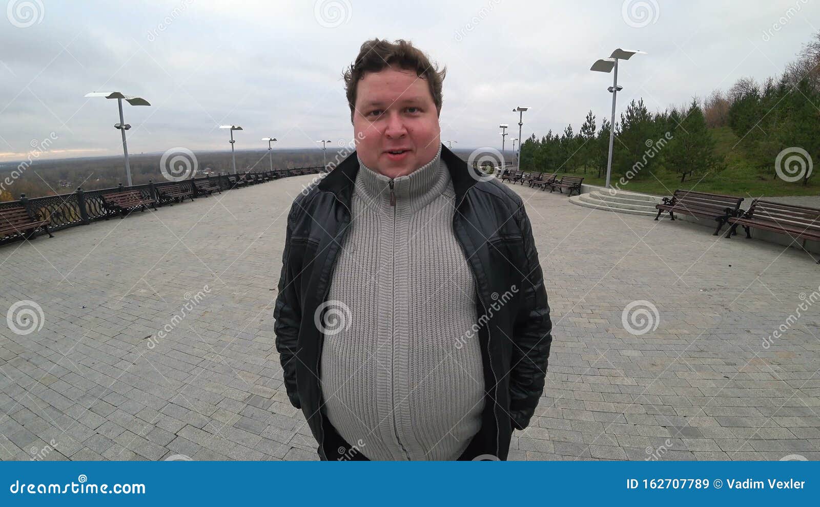 Wide Angle Lens: Young Fat Man Noticed Hidden Camera and Looks in it ...