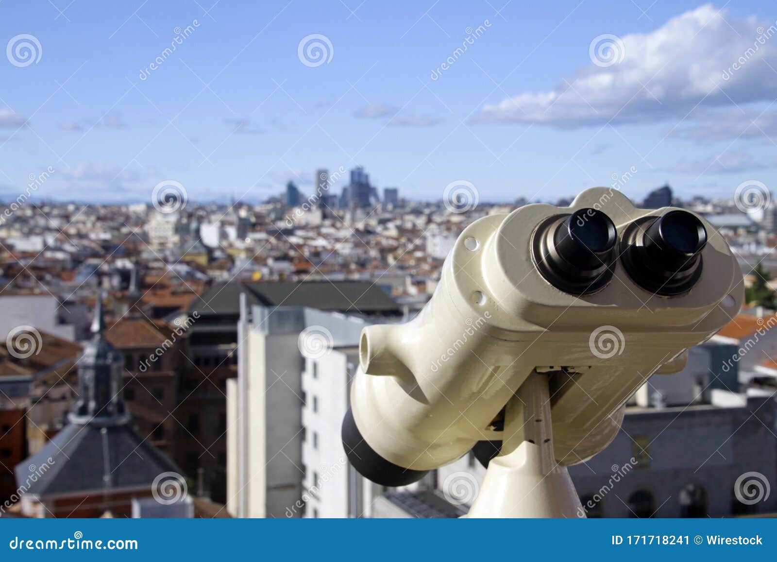 Wide Angle Shot of Binoculars Looking at the Buildings of a City Stock ...