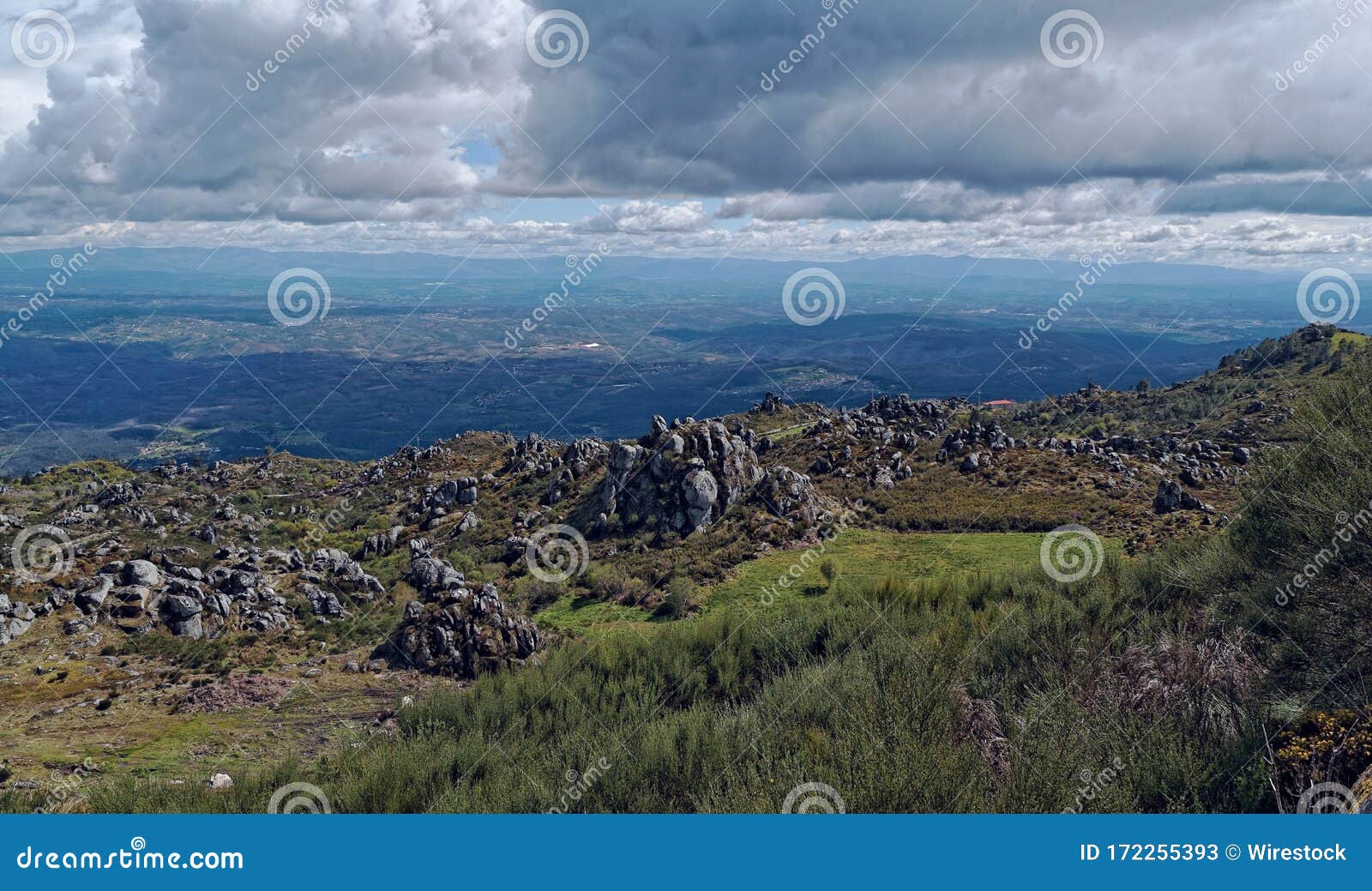 Wide Angle Shot of a Large Grassland Full of Rocks and Grass Stock ...