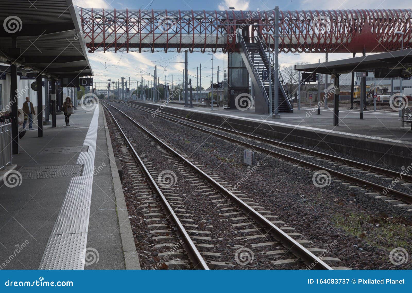 Wide Angle Shot of a Train Station with a Bridge Stock Image - Image of ...
