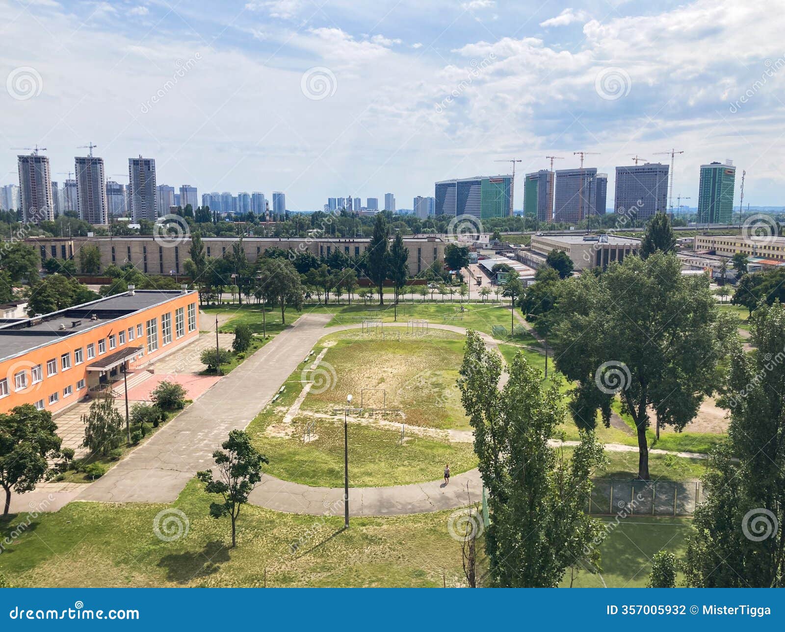Wide-angle Urban Landscape Image with Paved Open Space, Structure Under ...
