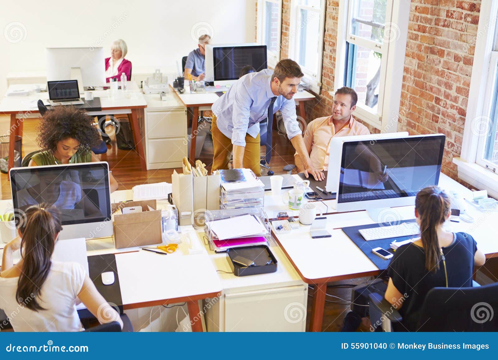 Wide Angle View of Busy Design Office with Workers at Desks Stock Photo ...
