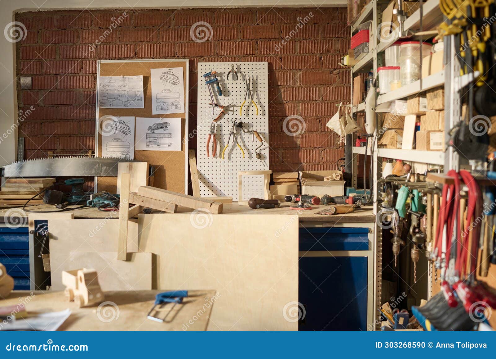 Carpentry Workshop with Tools and Wooden Models on Table Stock Photo ...