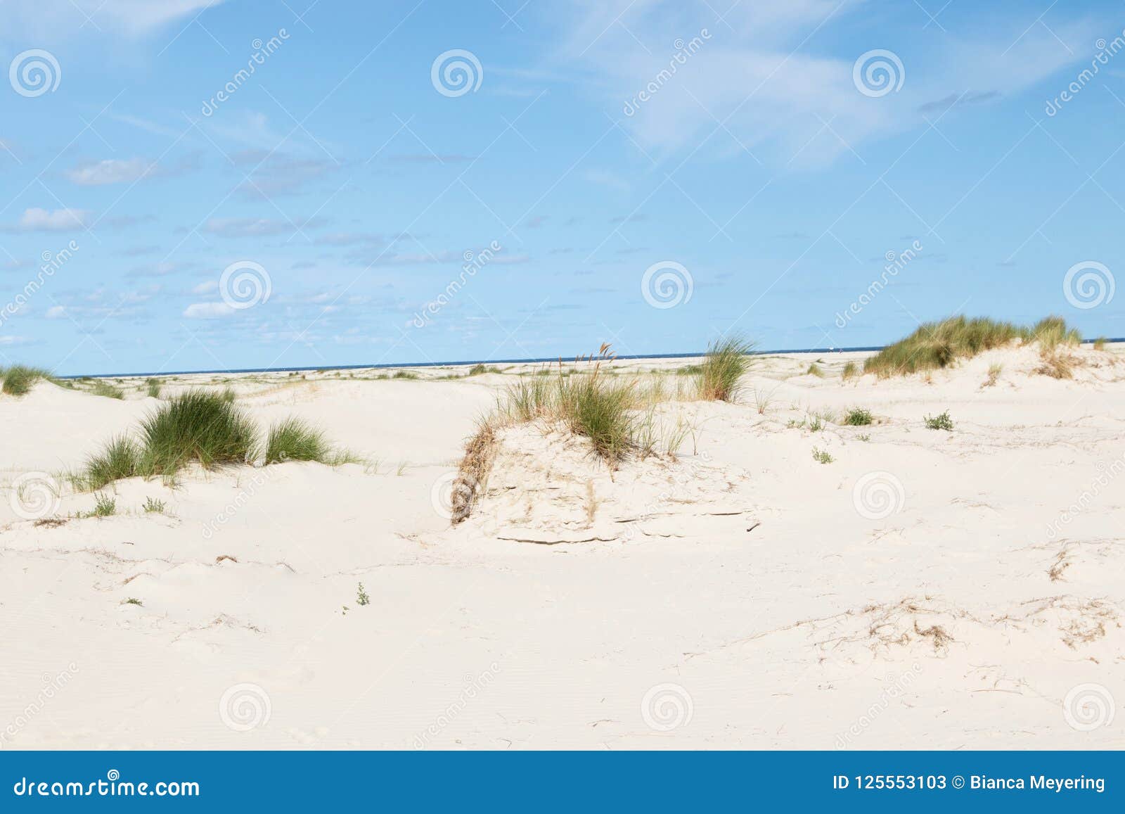 A Wide Angle View on the White Beach Sand and the Blue Sky with White ...