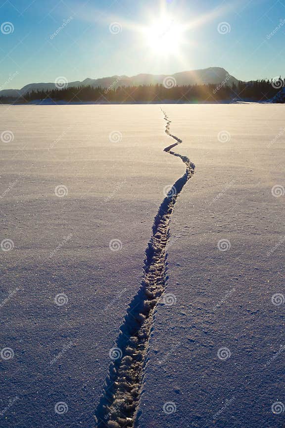 Wide Crack in Snow and Ice Surface Stock Image - Image of frozen, cool ...