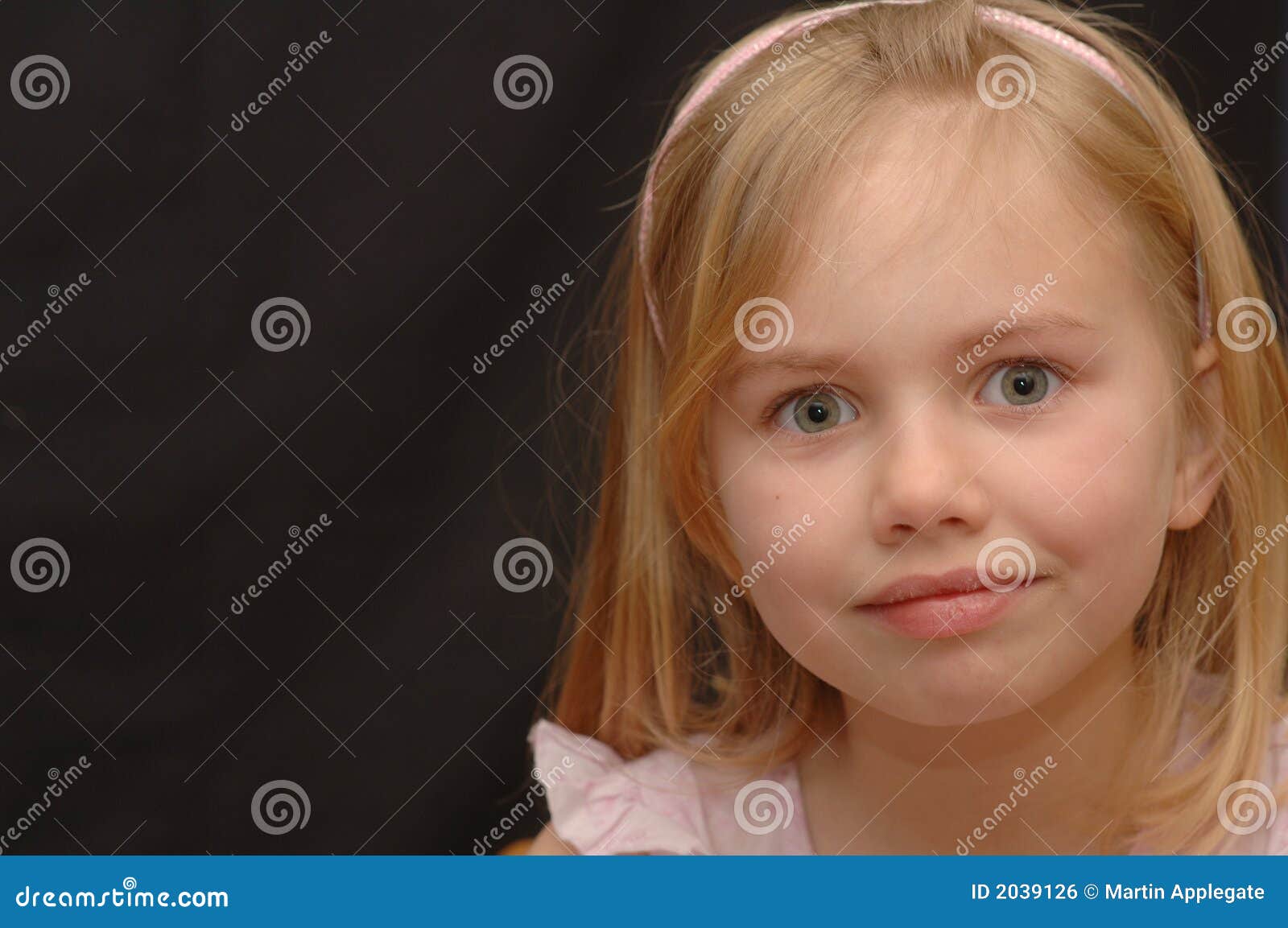 Wide-Eyed Girl stock photo. Image of demure, expressive - 2039126
