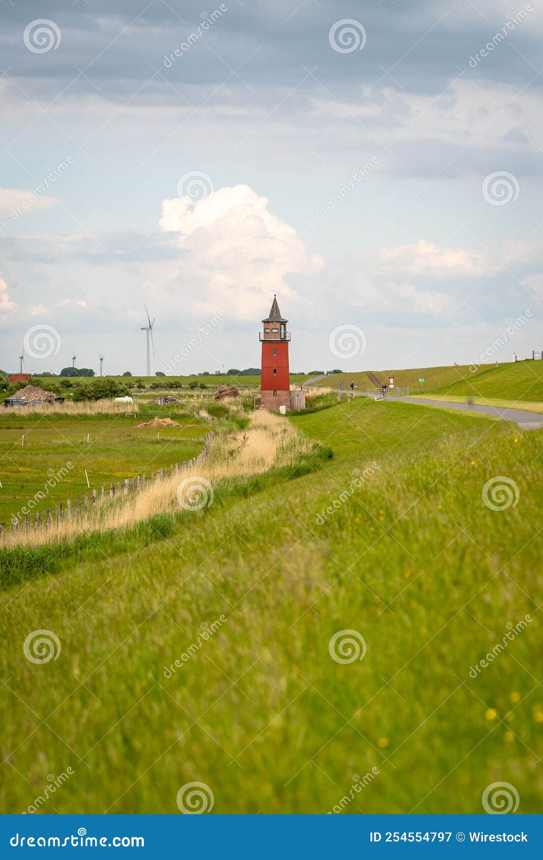 Wide Grassy Field Going To the Lighthouse Stock Image - Image of sunset ...