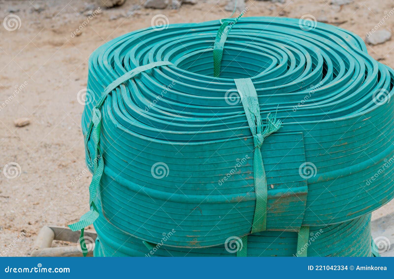 Wide Grooved Rubber Section Rolled Up Stock Photo - Image of ground ...