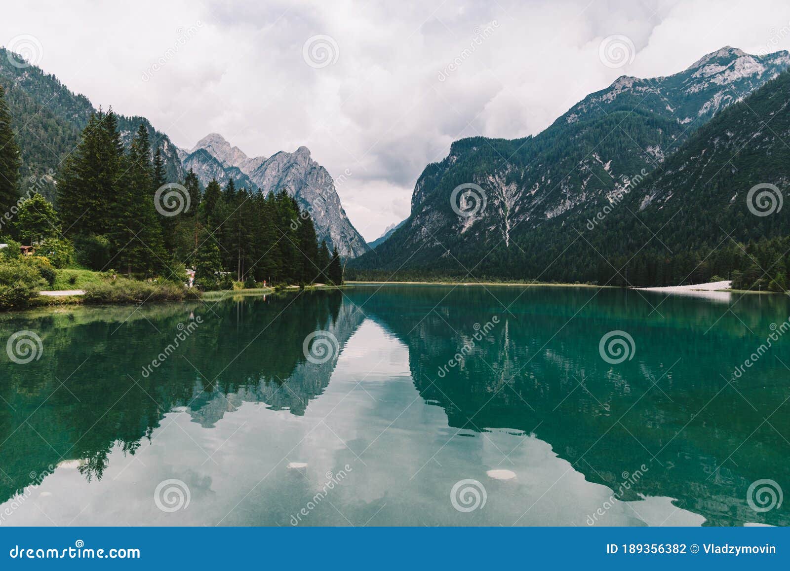 Wide Lake between Mountains Covered with Forest Stock Photo - Image of ...