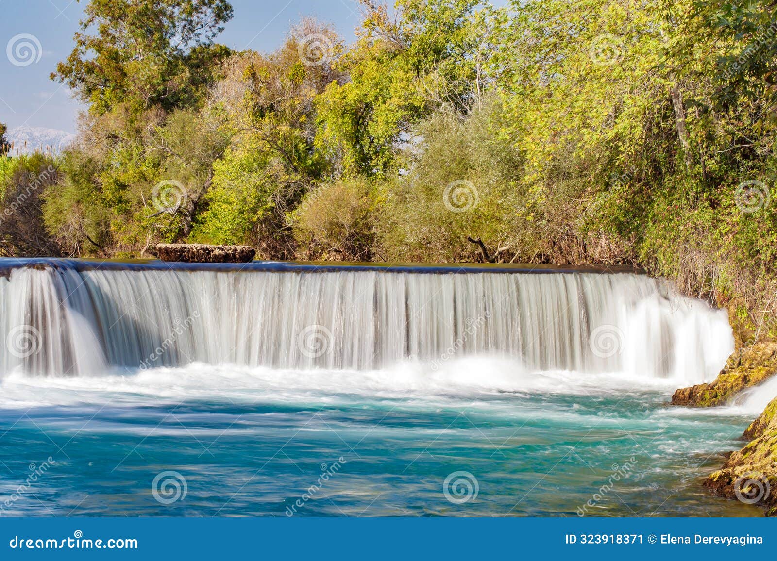 Wide and Low Waterfall on River, Blurred Water Movement Stock Image ...