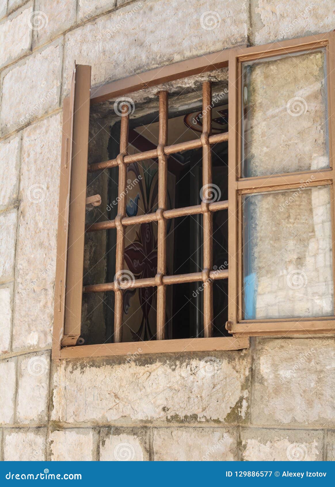 Wide open window with bars stock image. Image of building - 129886577