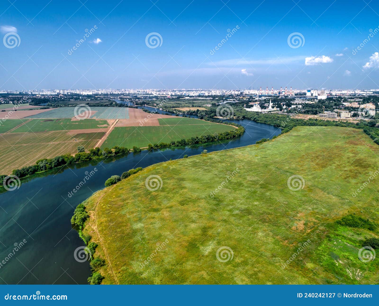 Wide River Flowing between Fields Stock Image - Image of environment ...