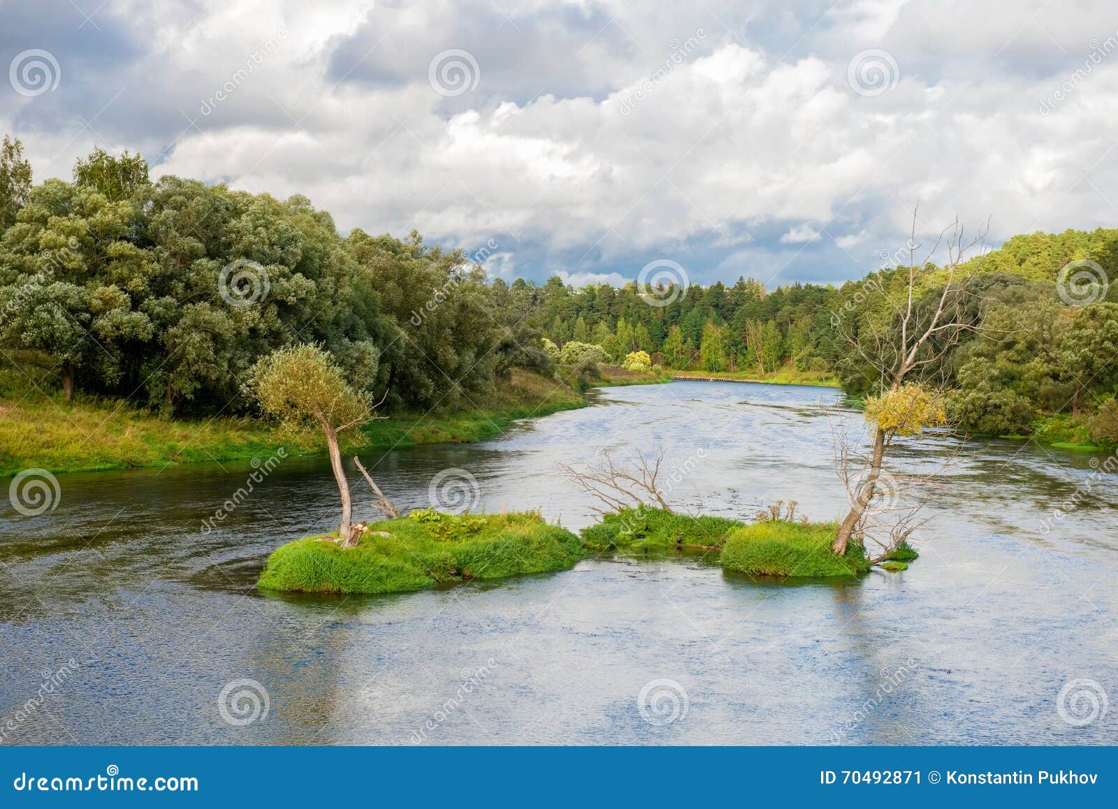Wide river in green banks stock image. Image of river - 70492871