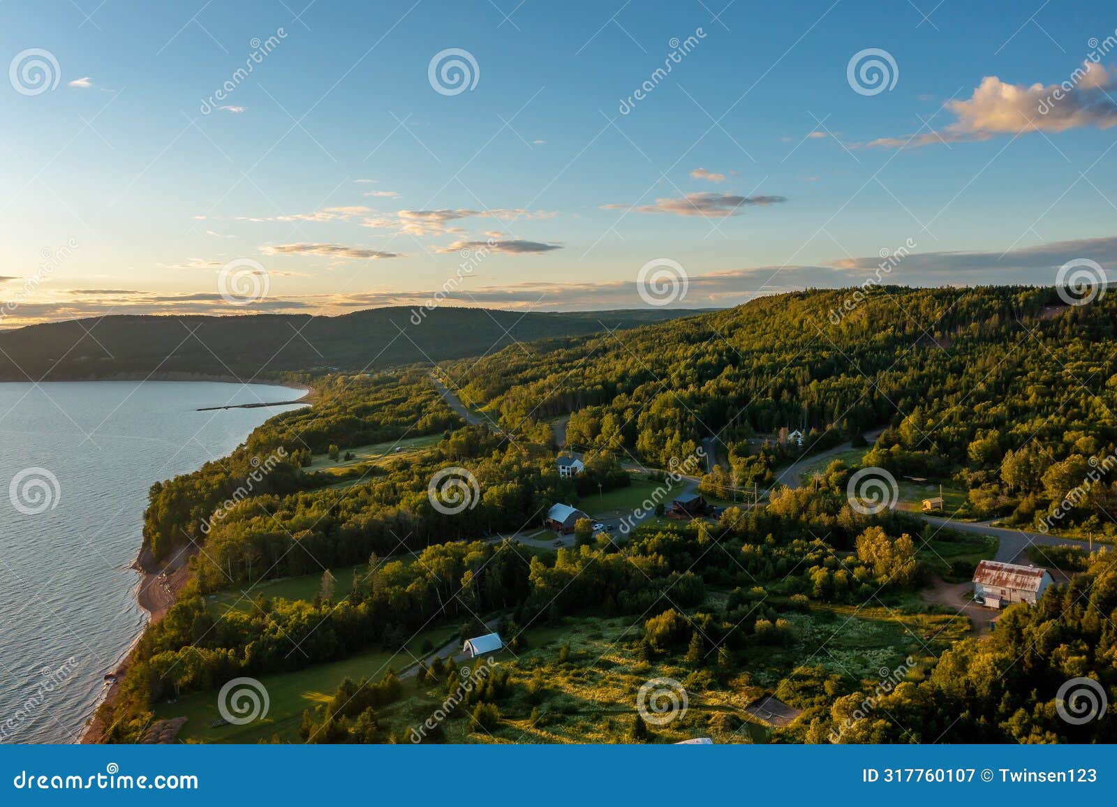 Wide River in Wooded Valley at Sunset in Quebec, Canada. Mountains on ...