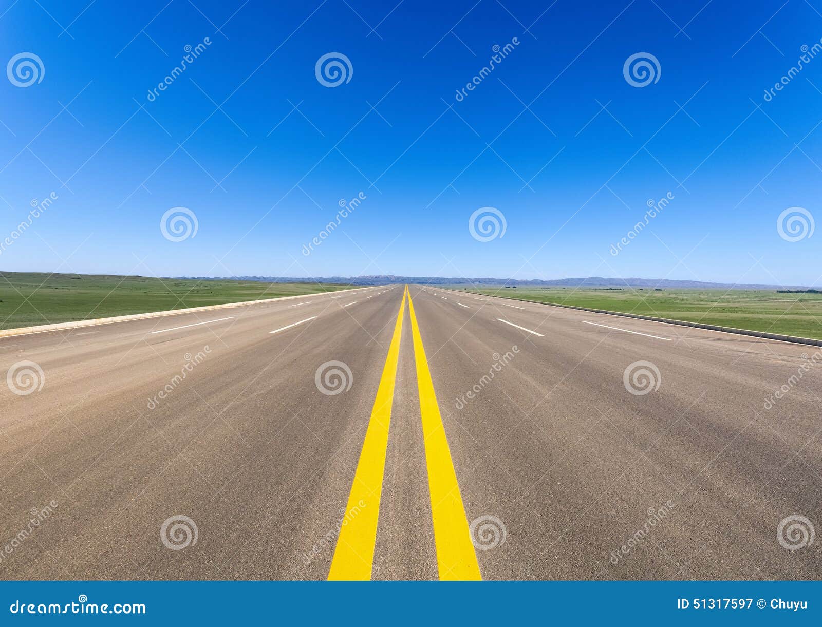 Wide road in prairie stock image. Image of hill, road - 51317597