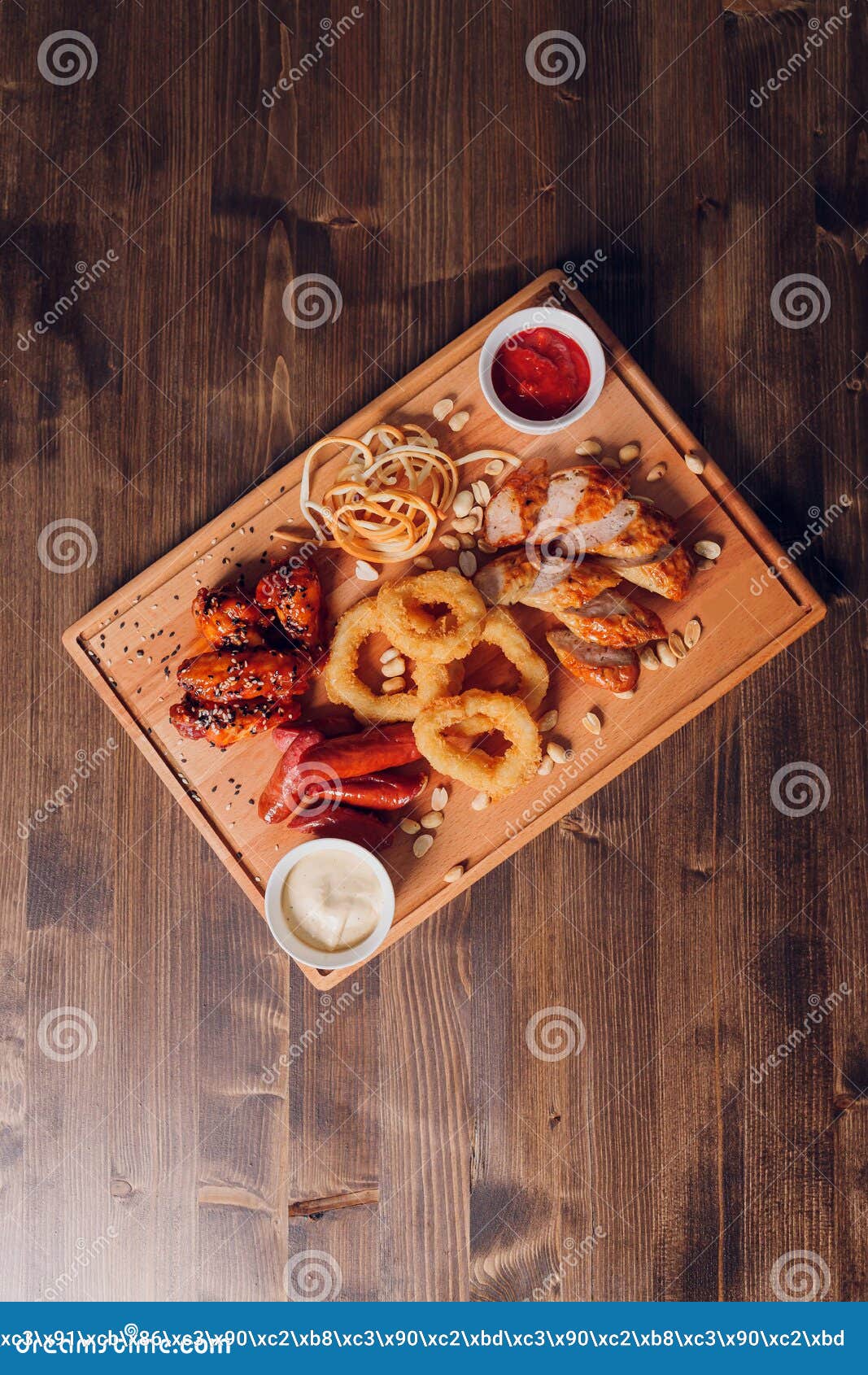 Wide Selection of Snacks for Beer with Different Sauces on Parchment ...