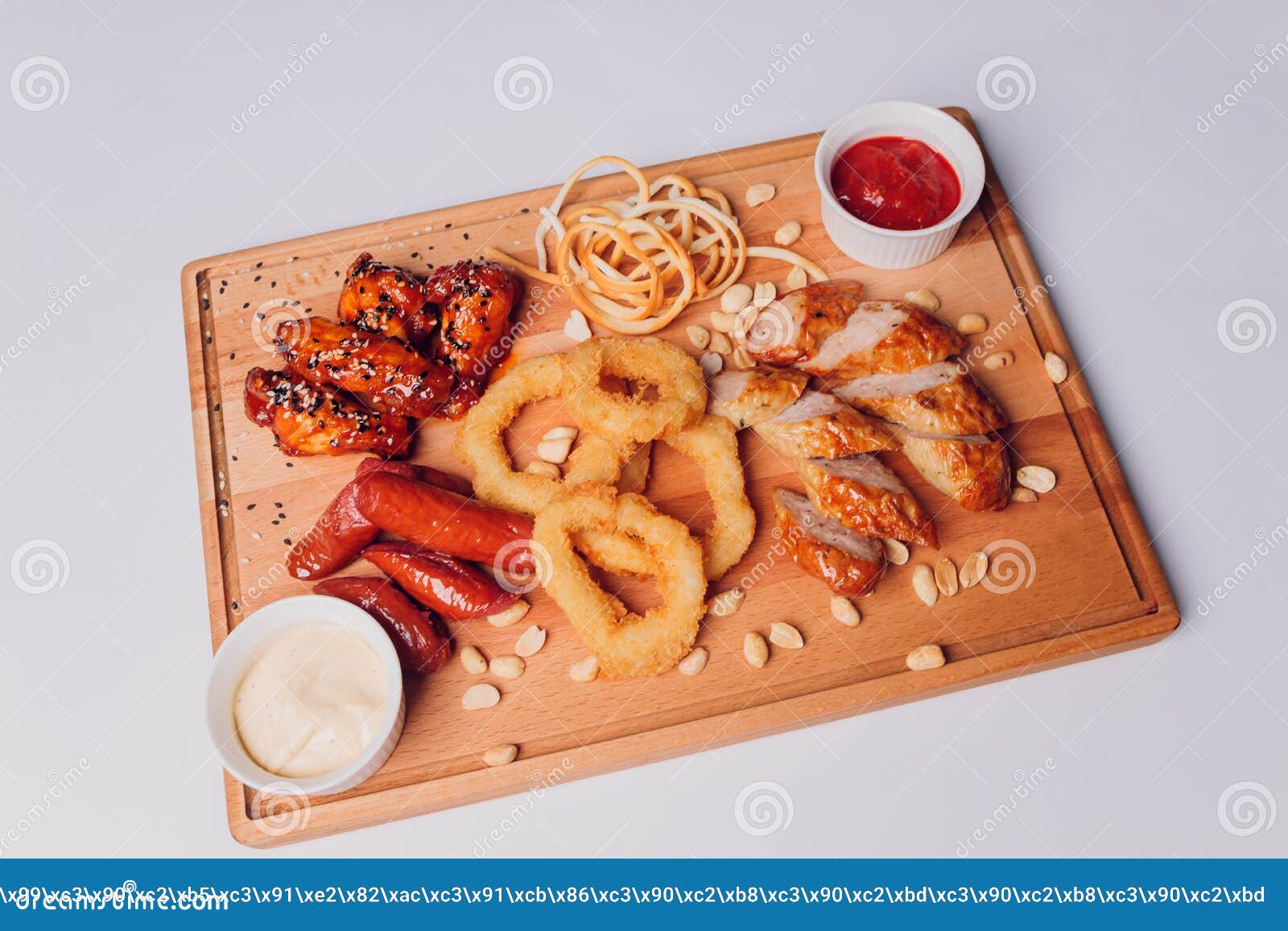 Wide Selection of Snacks for Beer with Different Sauces on Parchment ...