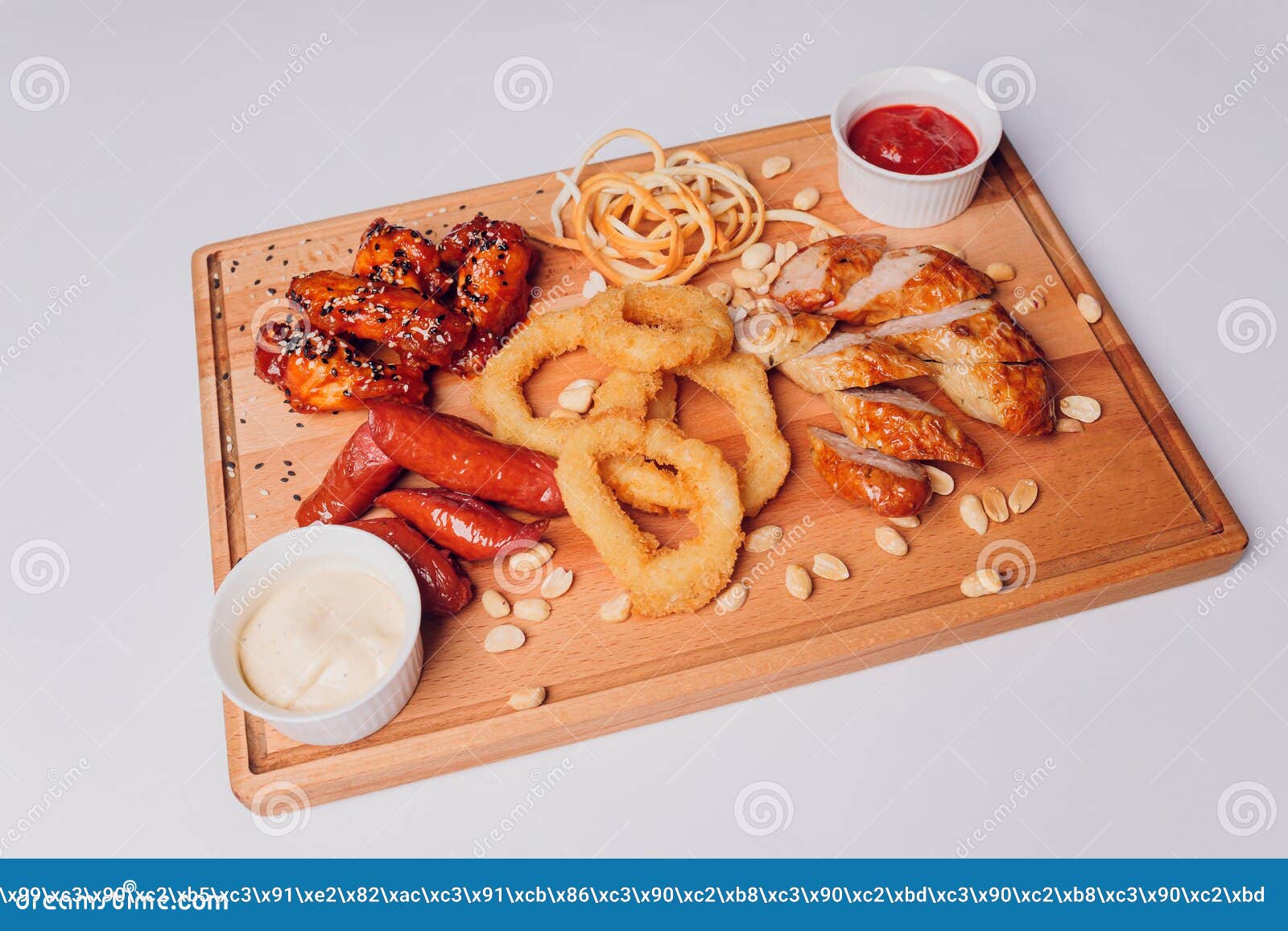 Wide Selection of Snacks for Beer with Different Sauces on Parchment ...