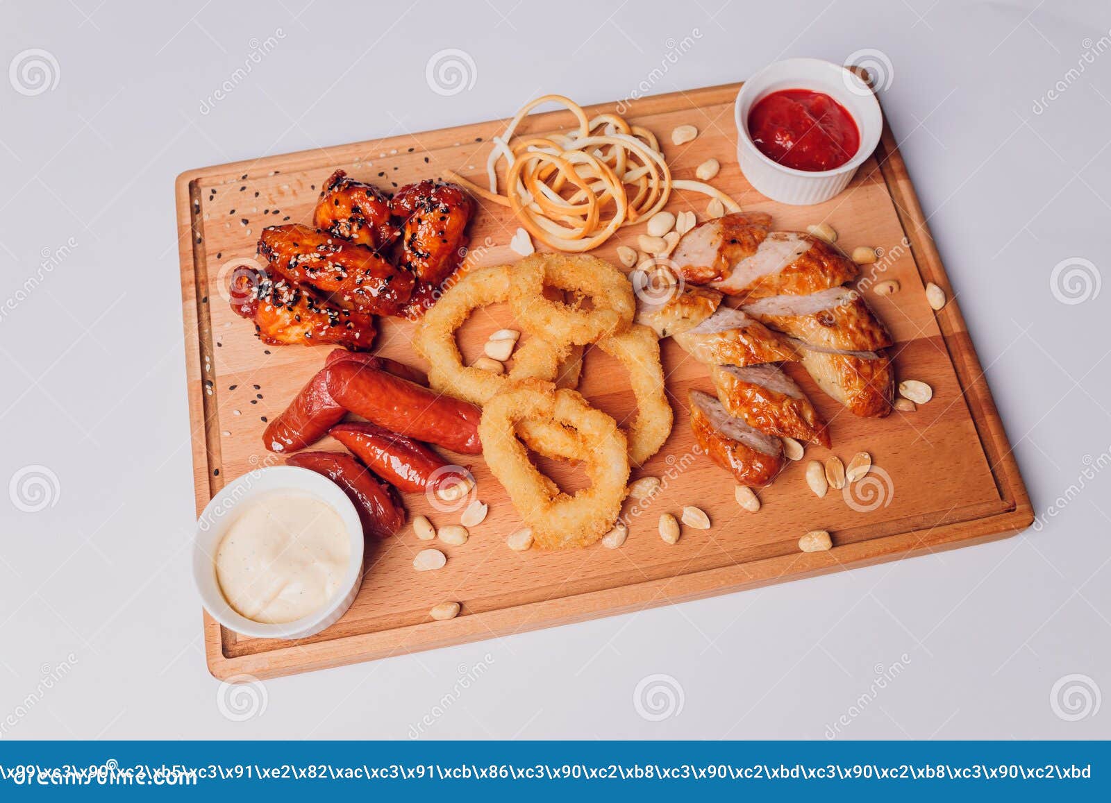 Wide Selection of Snacks for Beer with Different Sauces on Parchment ...