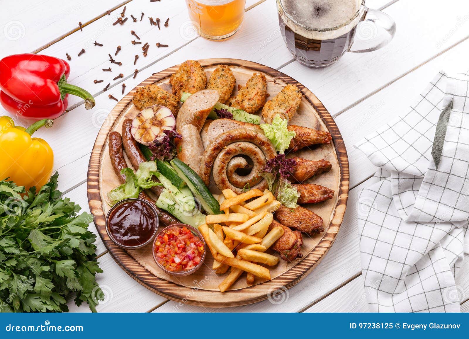 Wide Selection of Snacks for Beer with Different Sauces on Wooden Plank ...