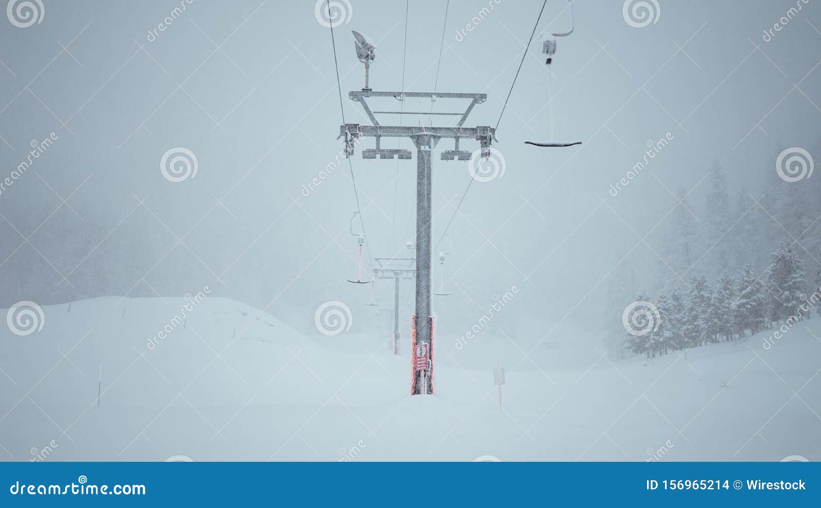 Wide Shot of a Gray Ropeway Pillar Covered in Snow Stock Photo - Image ...