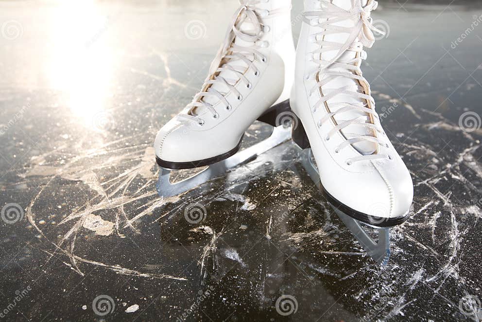 Wide Skates on Ice with Sun Stock Image - Image of iceskating, cold ...