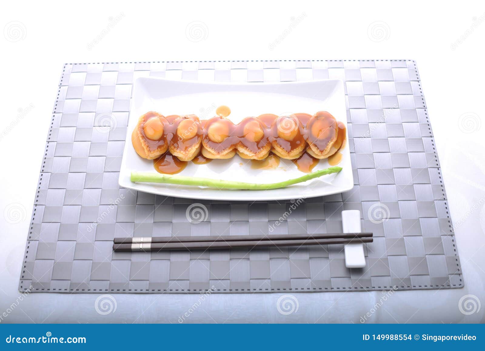 Abalone Servings In A Fine Dining Setting On Black Table Mat Royalty ...