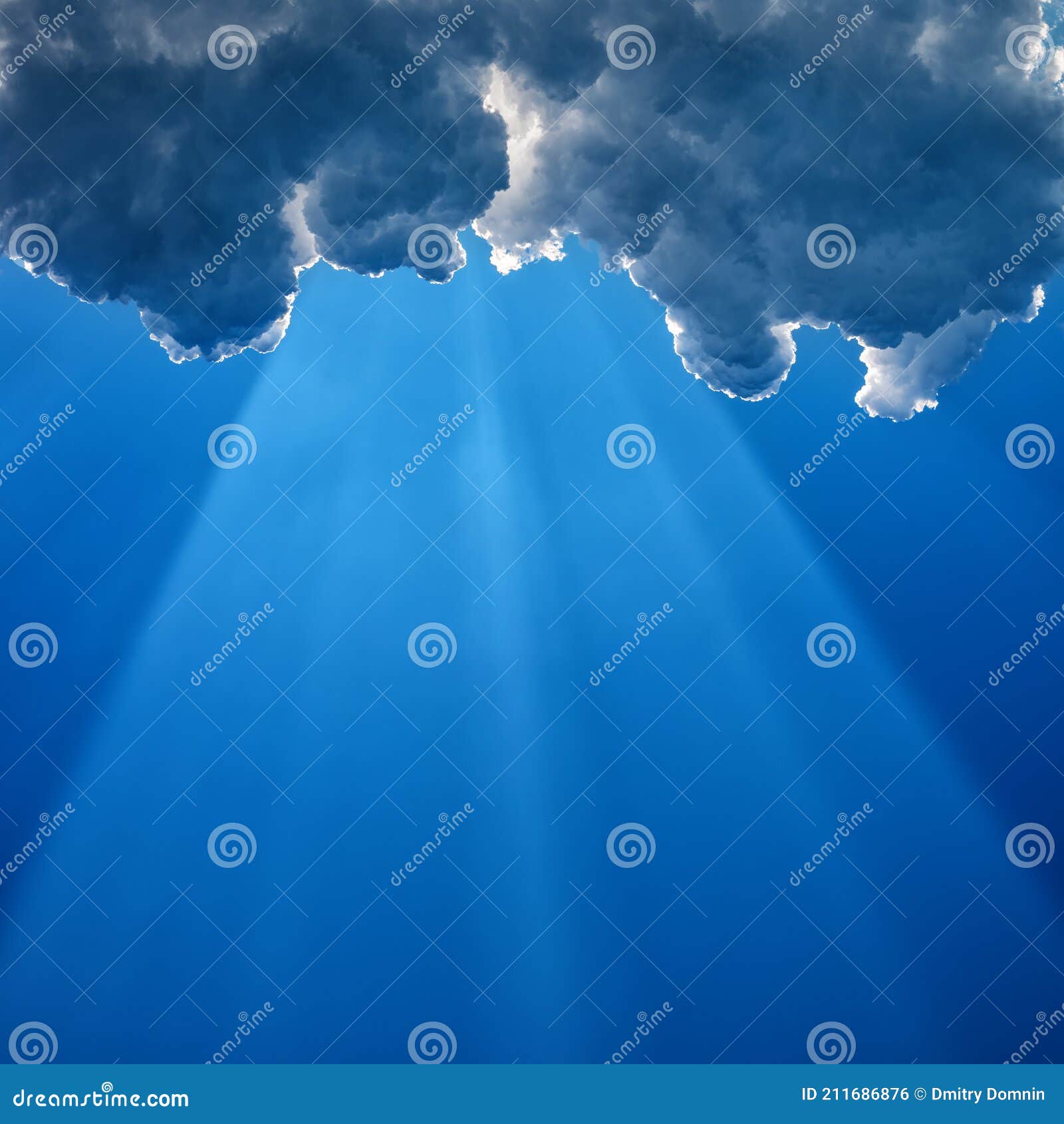A Wide Sunray Breaks through Dark Cumulus Clouds Stock Photo - Image of ...