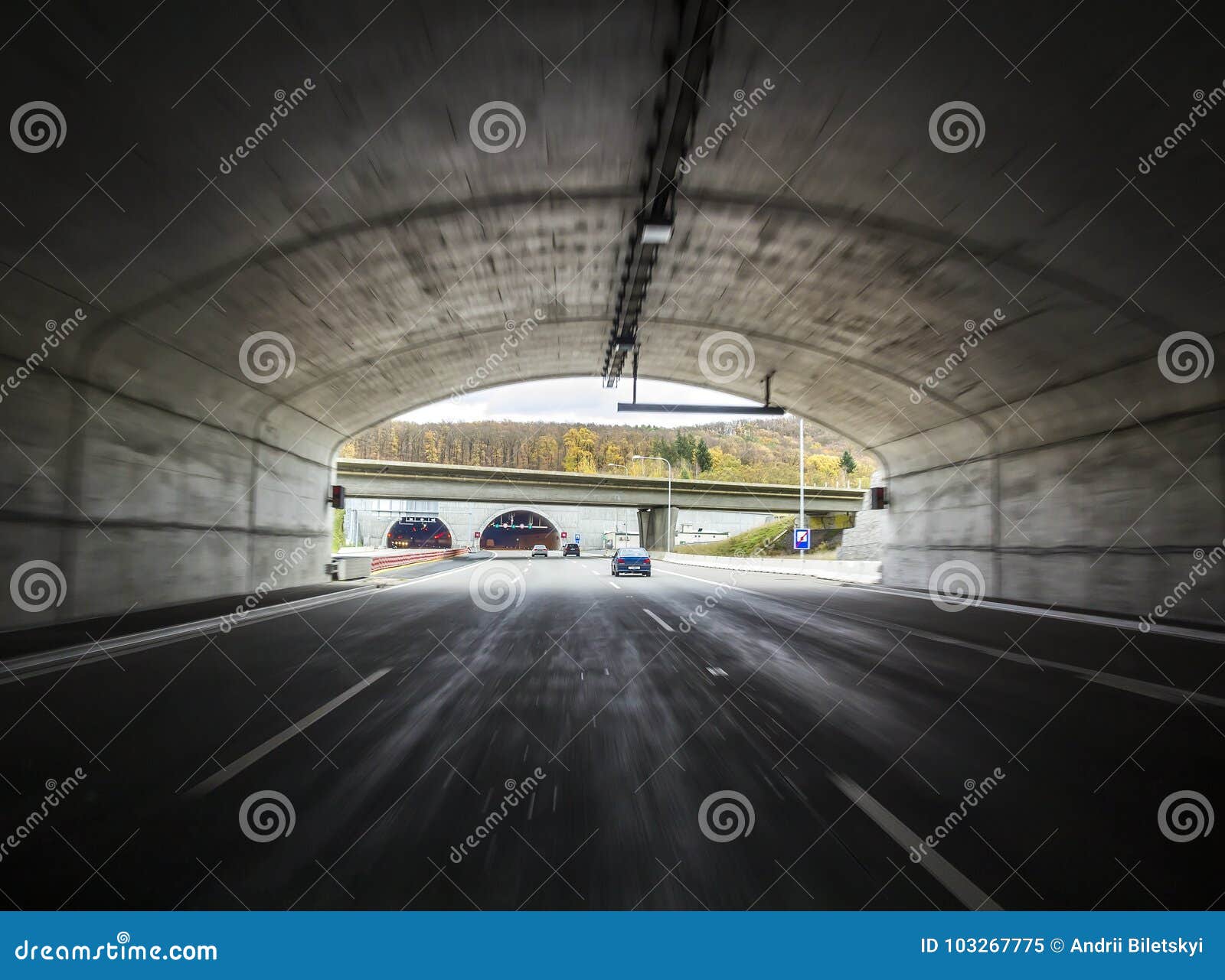 Wide Tunnel on a Freeway with Moving Cars Stock Image - Image of ...