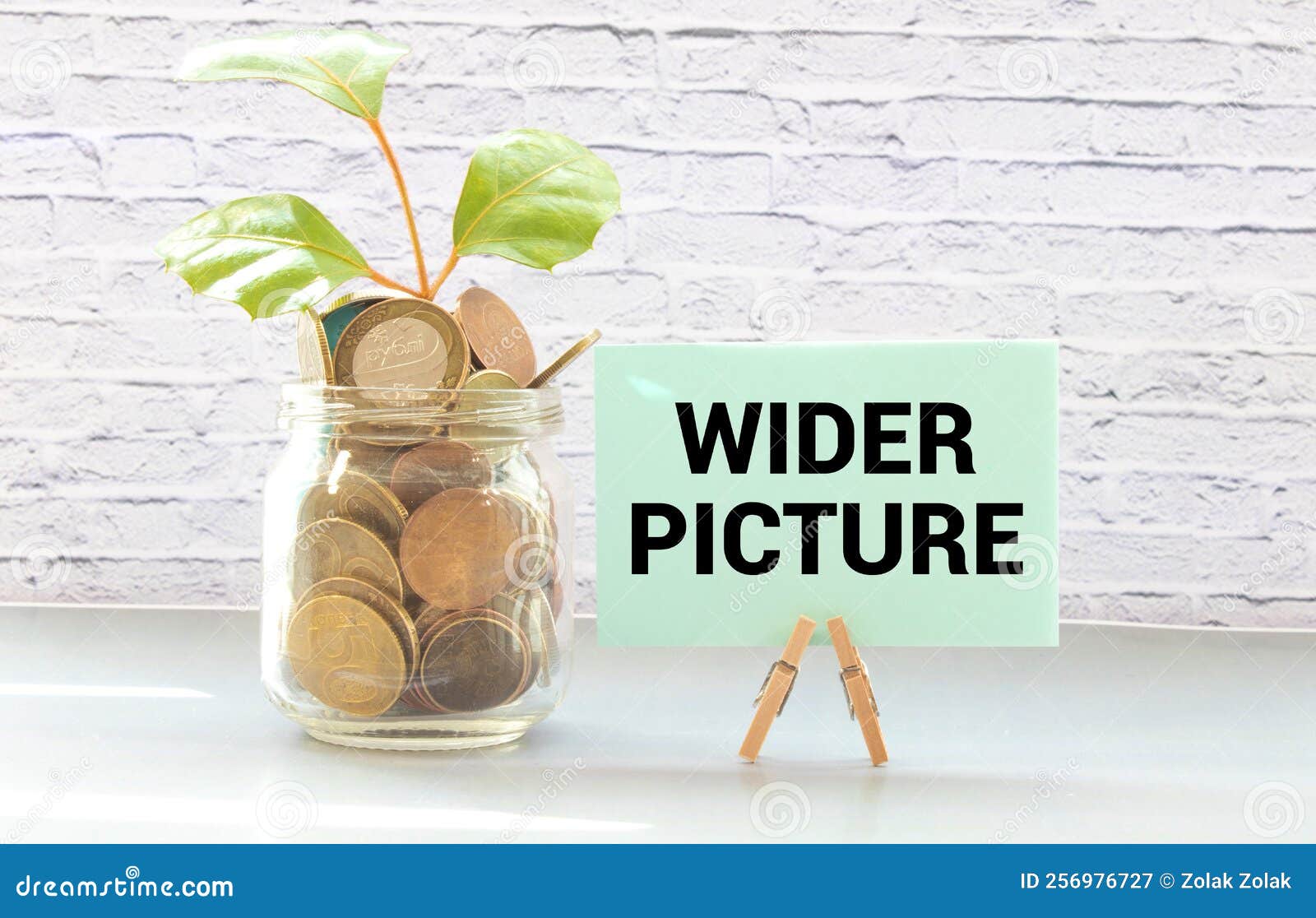 Wider Picture, Text on White Paper on Gray Background Framed Stock ...