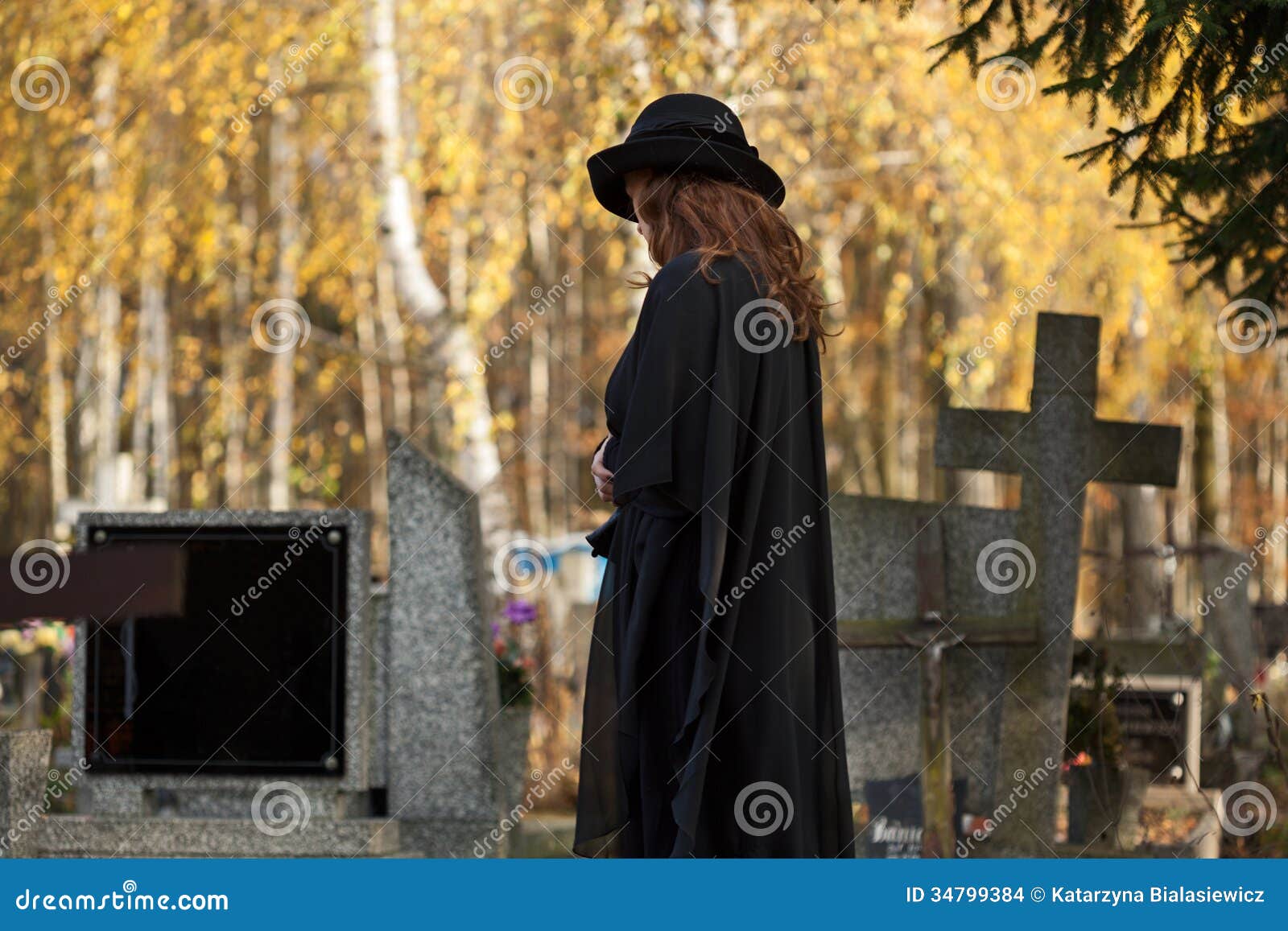 Widow Looking at the Gravestone Stock Photo - Image of leaves ...