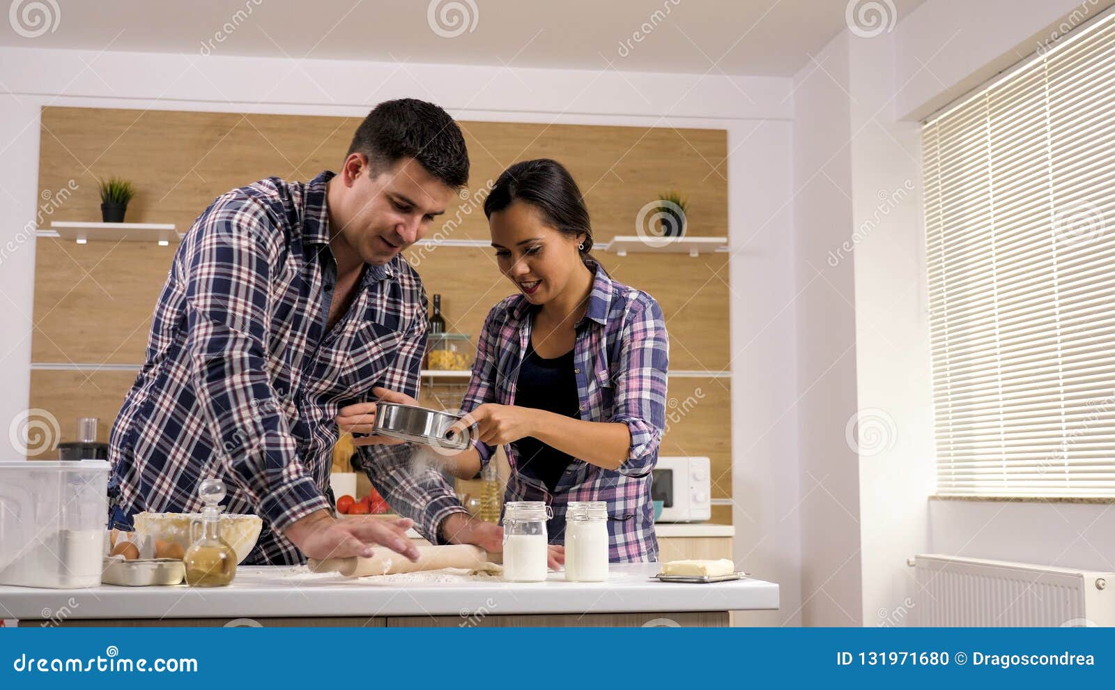 Wife Helping Her Husband in the Kitchen Stock Photo - Image of ...