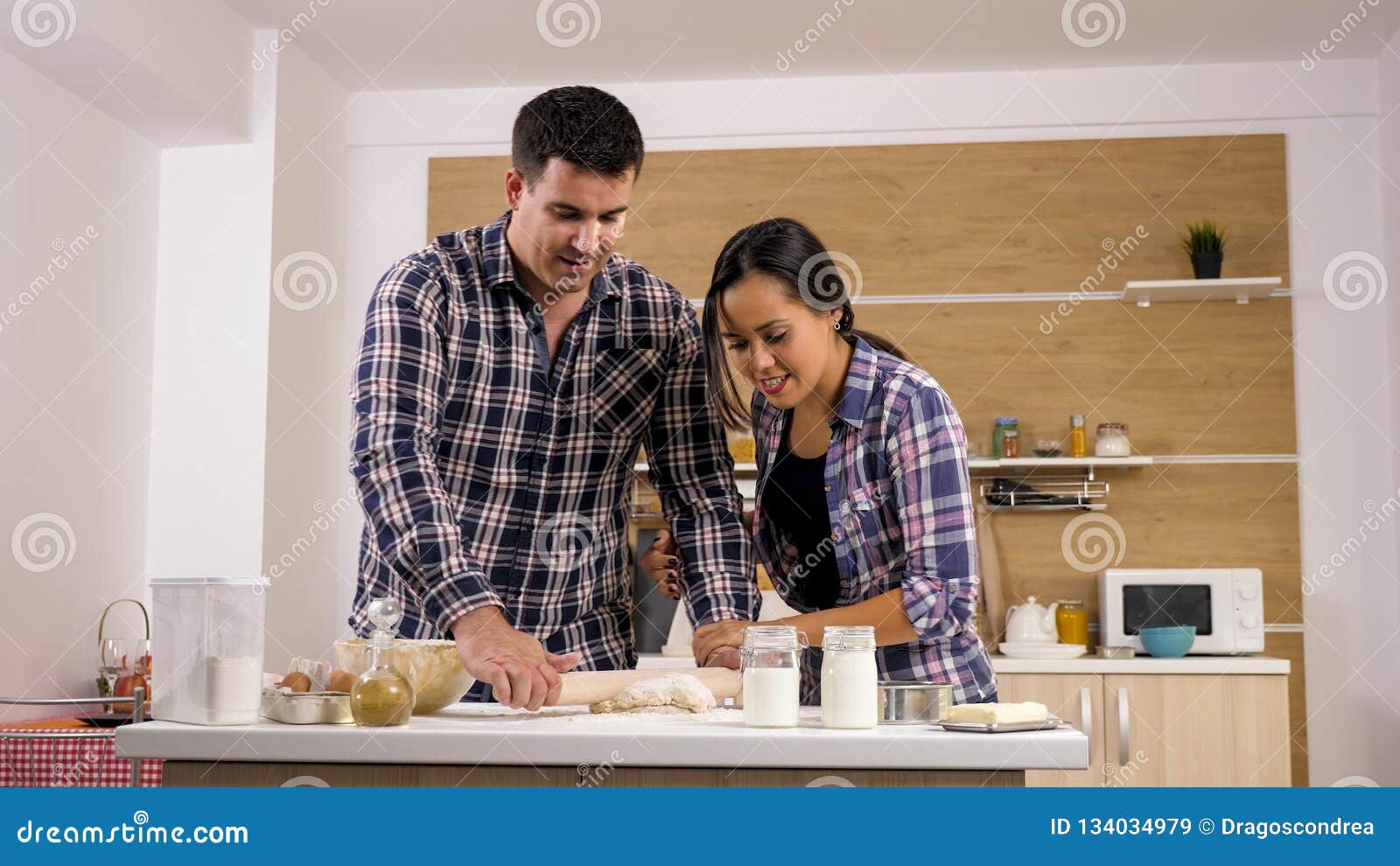Wife Helping Her Husband in the Kitchen Stock Image - Image of ...