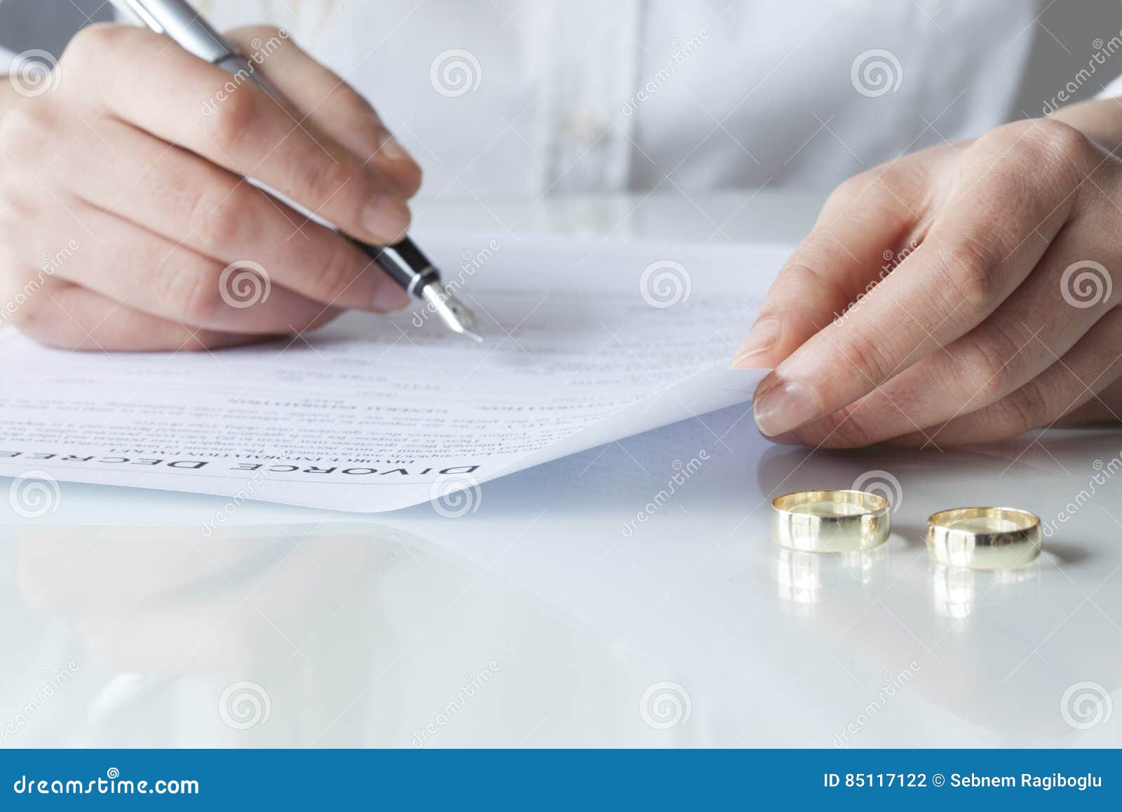 Wife Signs Divorce Decree Form with Ring Stock Photo - Image of ...