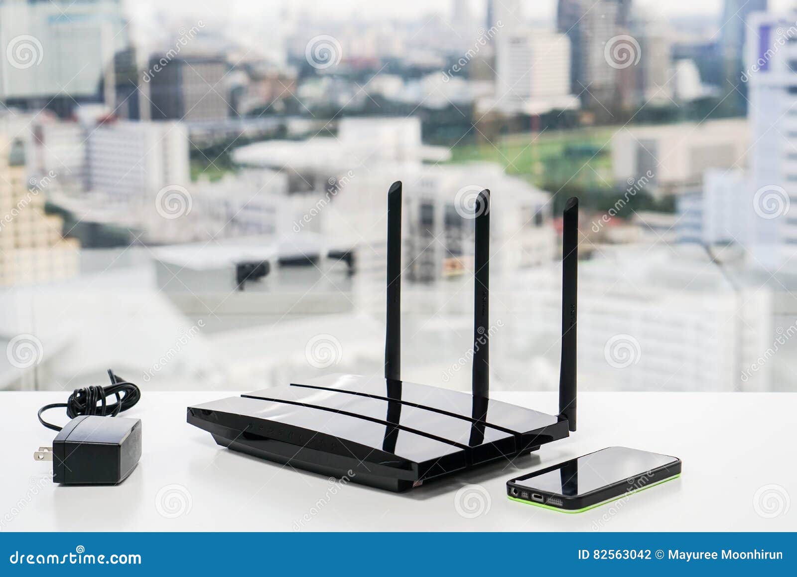 WiFi Router and Charger with Smartphone Stock Photo - Image of pointing ...