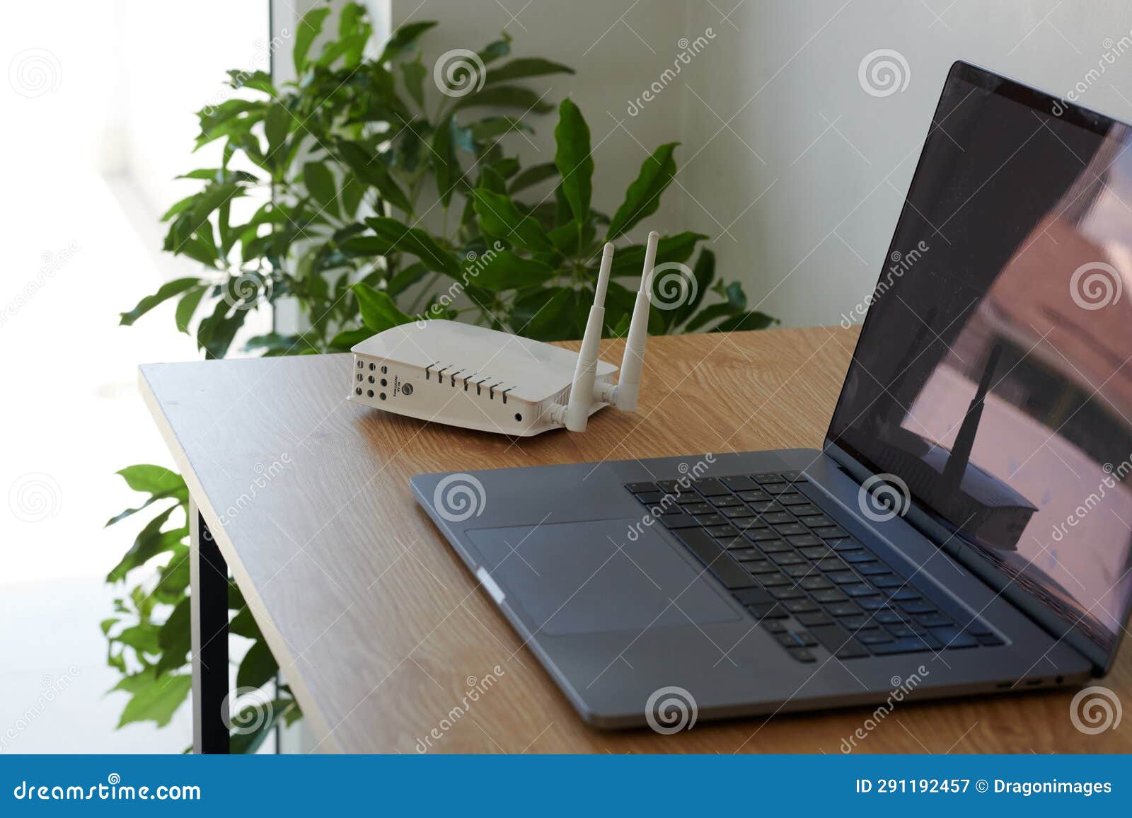 Wifi Router and Laptop on Desk Stock Image - Image of internet, router ...