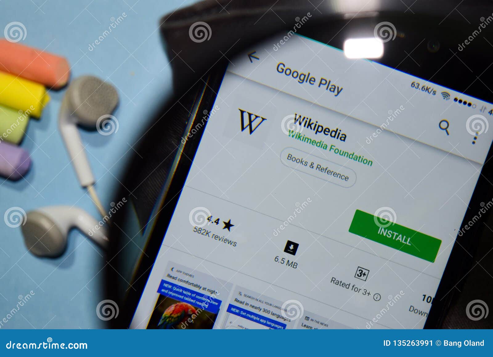 Wikipedia Dev App with Magnifying on Smartphone Screen. Editorial Photo ...