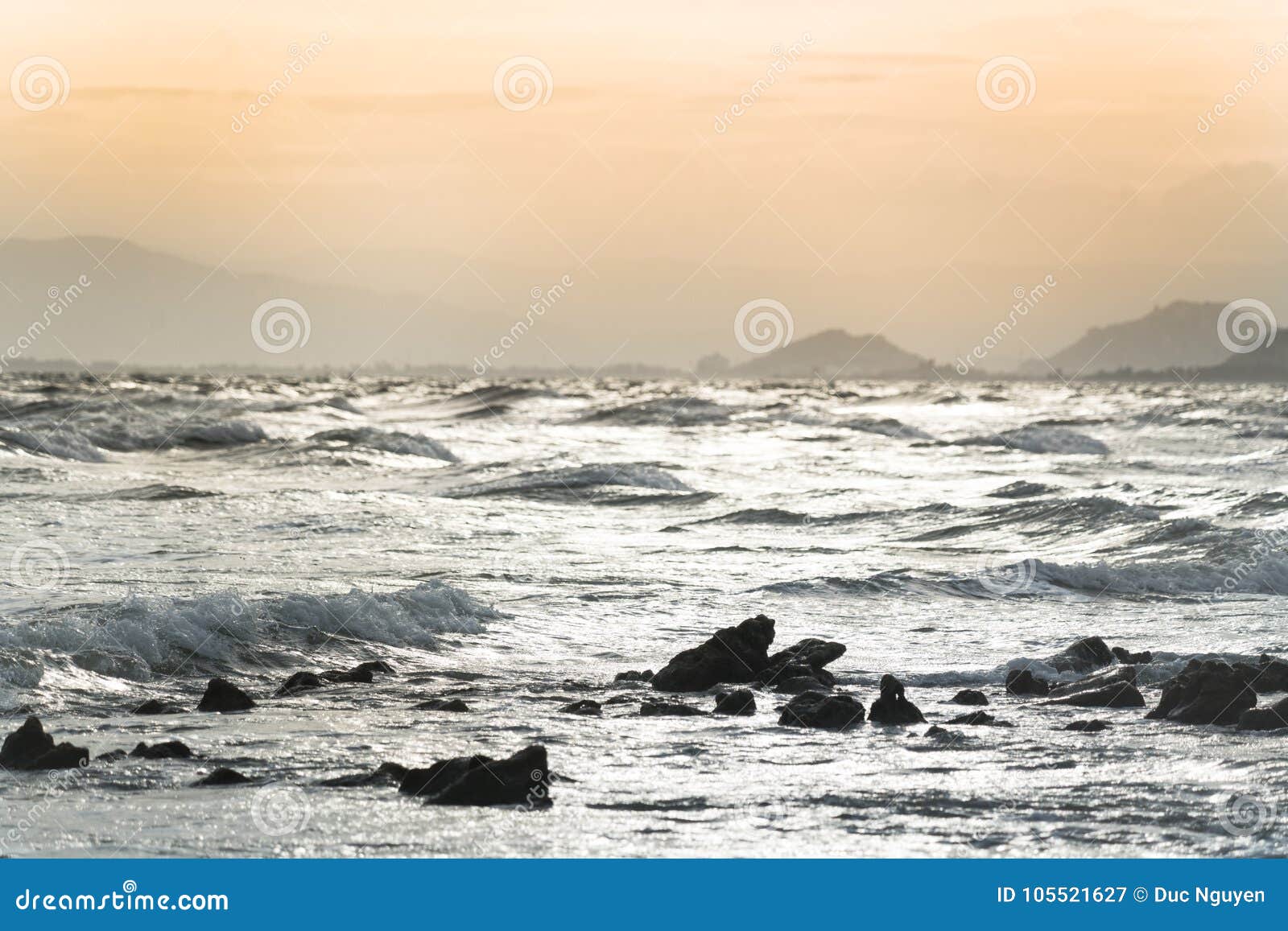 Mesmerizing Silky Waves in Twilight Splashing on Rocks. Stock Image ...