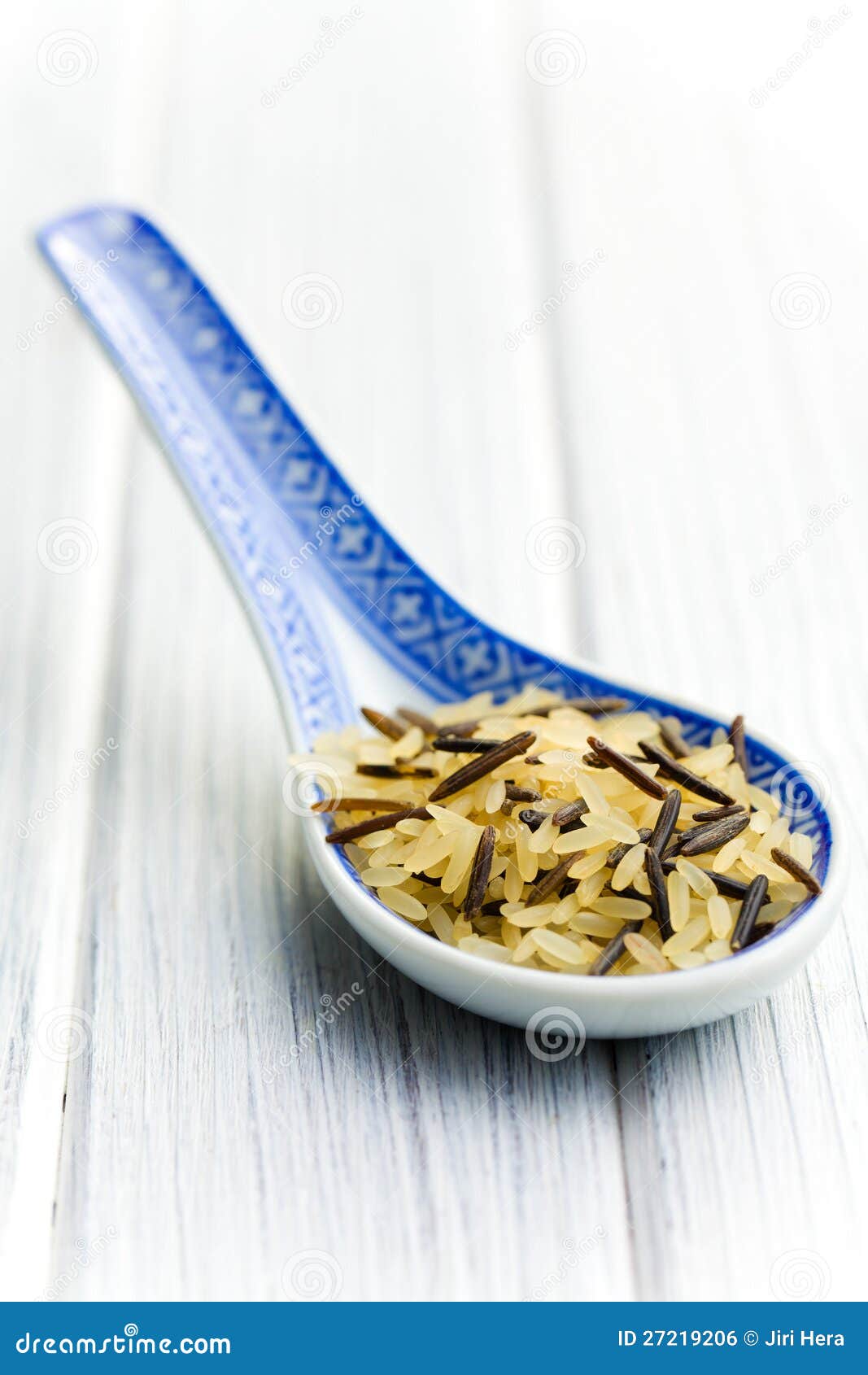 Wild rice in ceramic spoon stock photo. Image of east - 27219206
