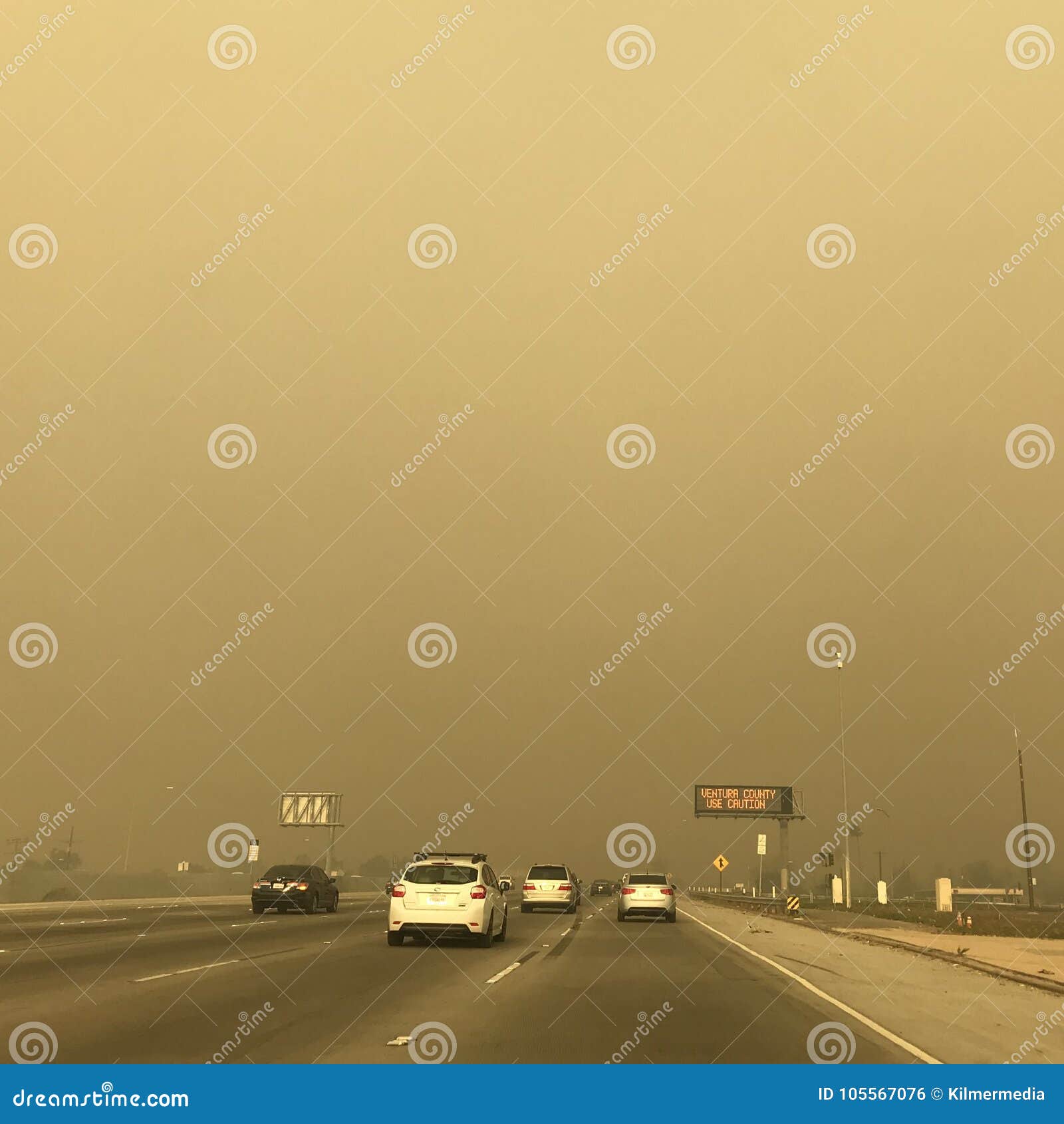 Wildfire Smoke Engulfing a Roadway Stock Photo - Image of media ...