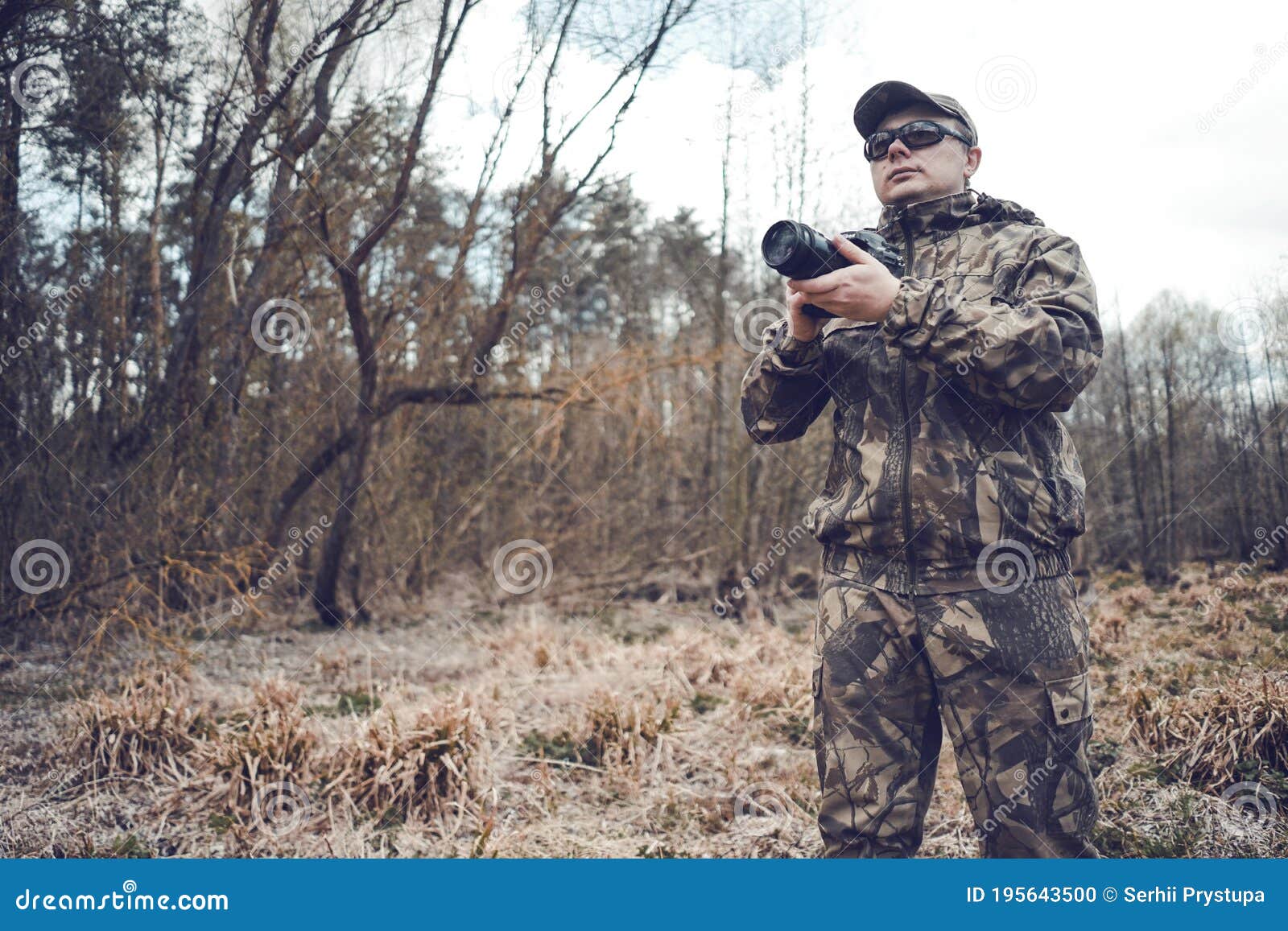 Wildlife Photographer in the Forest with a Camera Stock Photo - Image ...