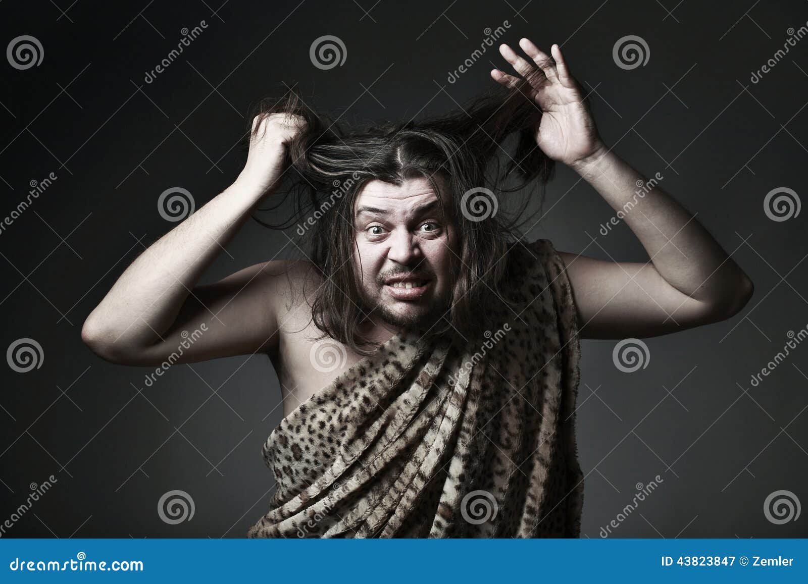 Wildman in leopard skin stock image. Image of barbarian - 43823847