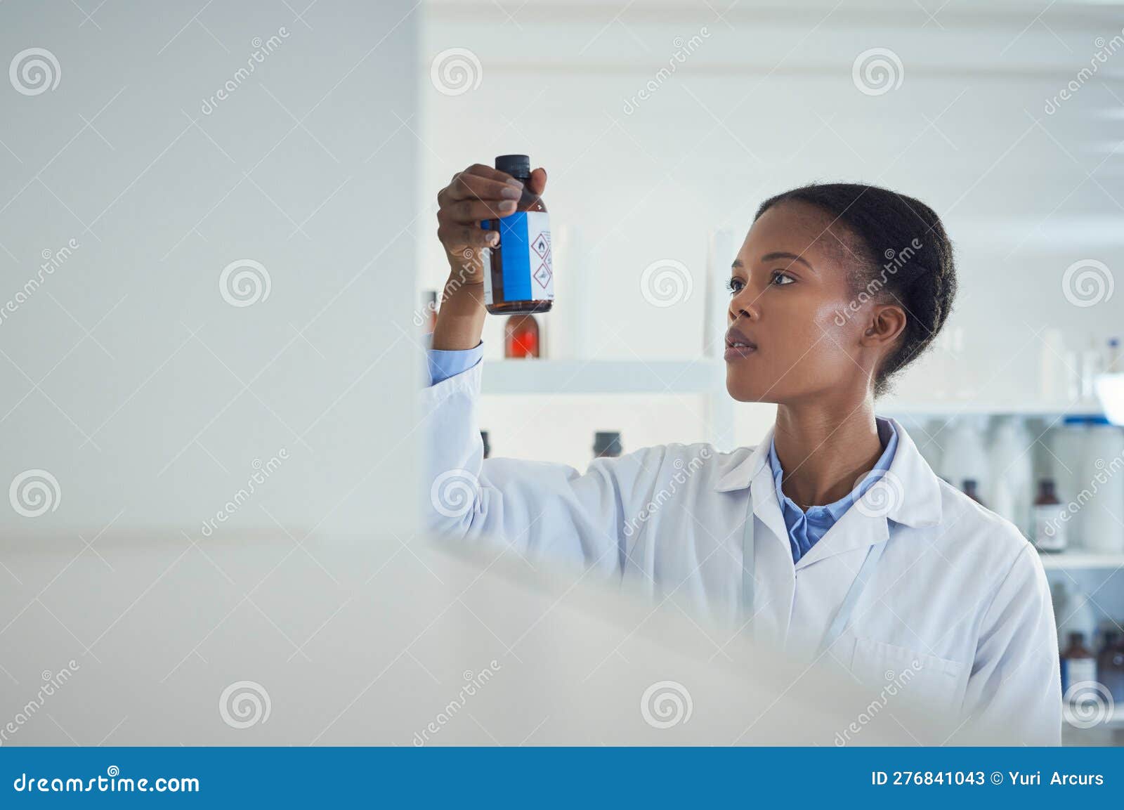 This Will Change Everything. a Young Scientist Working in a Lab. Stock ...