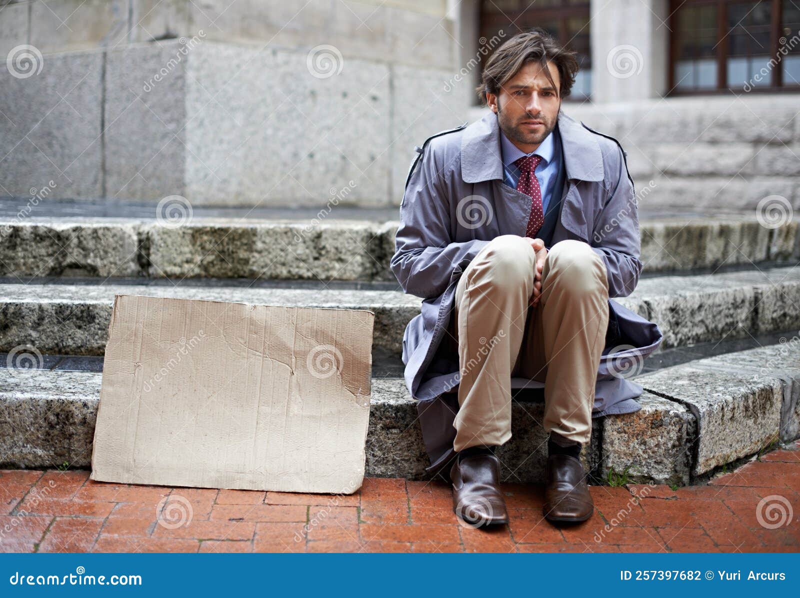 Will Model for Food. View of an Unemployed Businessman Sitting on the ...