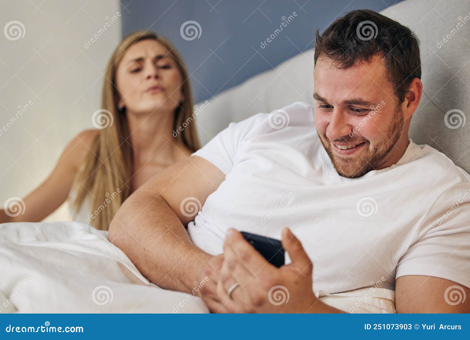 It Will Never End Shot Of A Woman Looking Over Her Husbands Shoulder