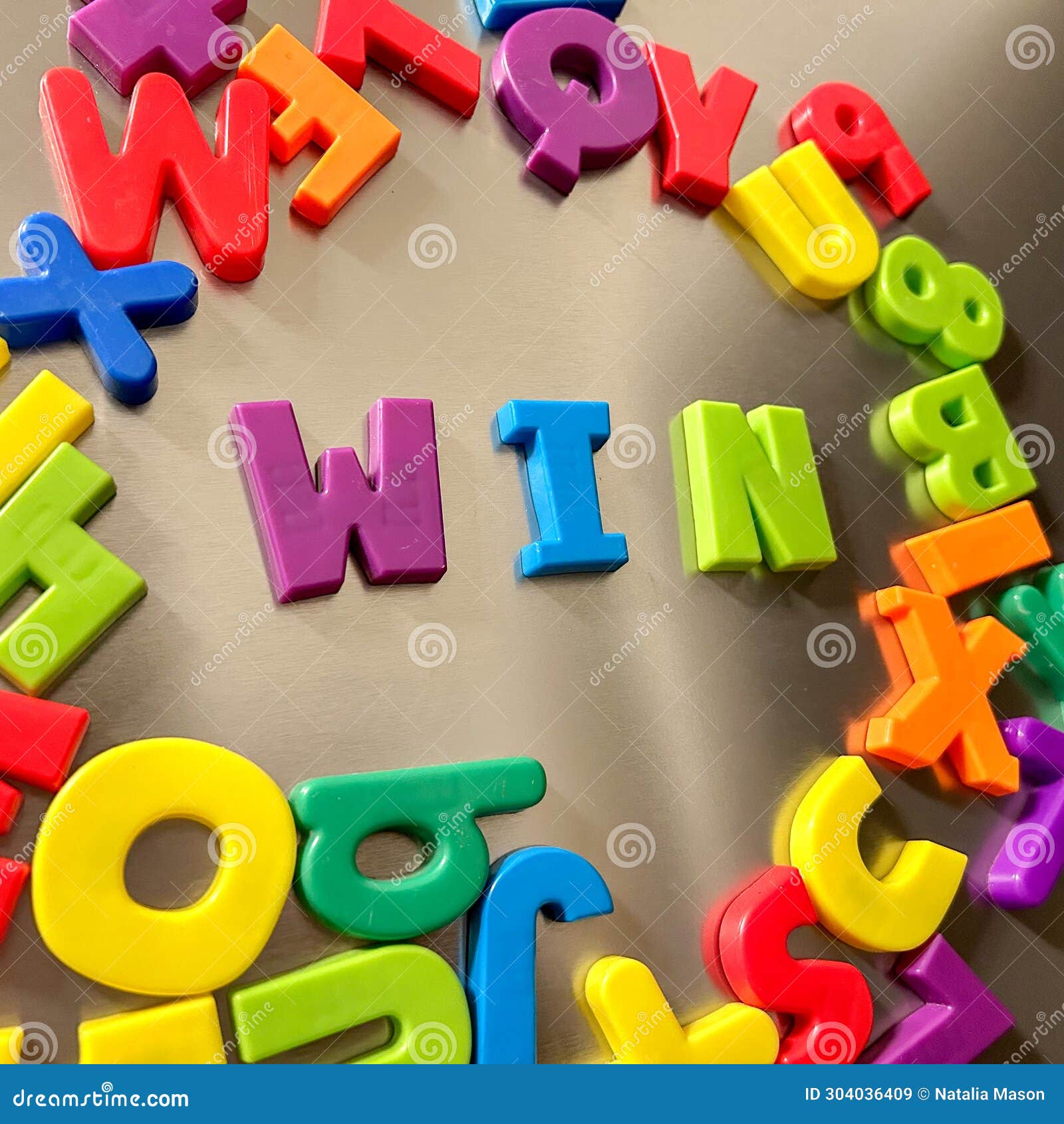 Win Written in Colourful Magnetic Letters Stock Image - Image of ...